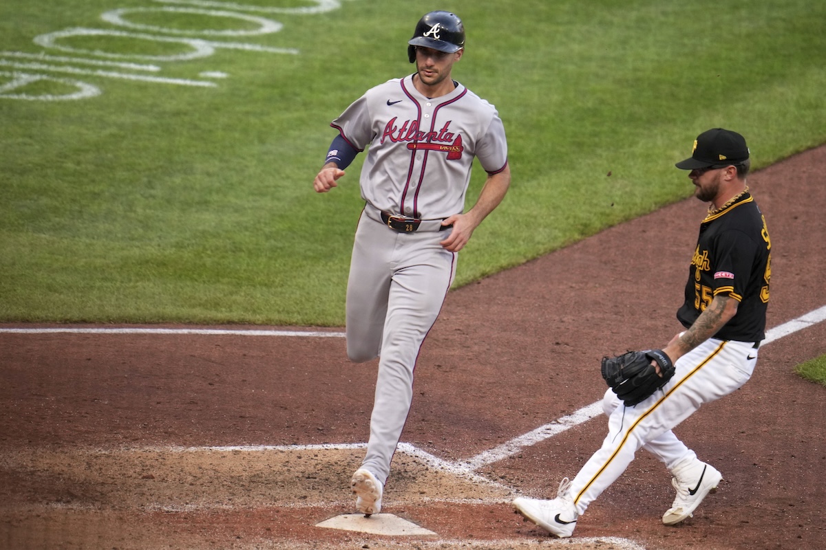 Matt Olson homers, scores winning run on wild pitch in 11th as Braves ...