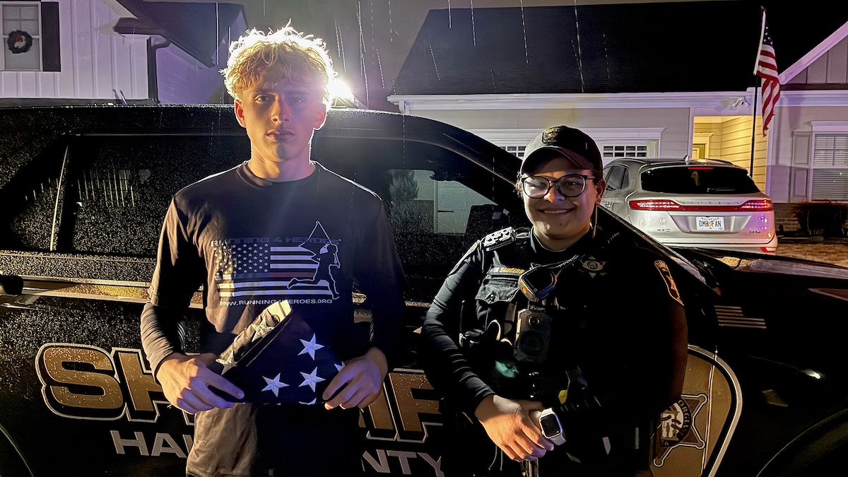 Volunteer runner honors fallen National Guard specialist during Hall ...